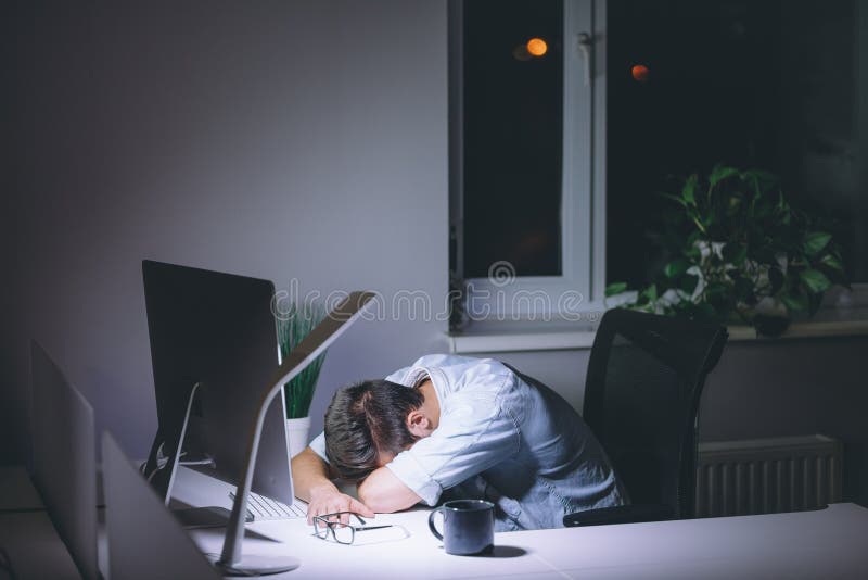 Sleeping Young Man Working on Computer at Night in Dark Office Stock ...
