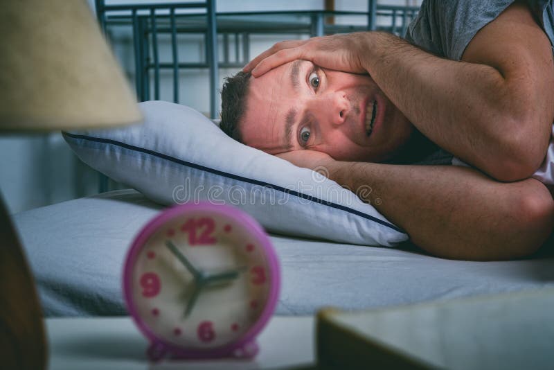 Sleepless Man in Bed stock photo. Image of irritated - 68633434