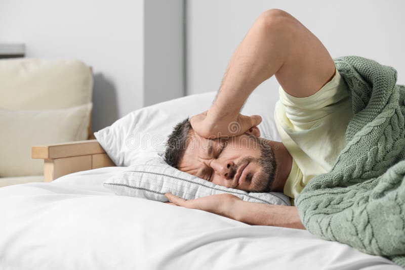 Sleepless Man Lying in Bed at Home Stock Image - Image of exhausted ...