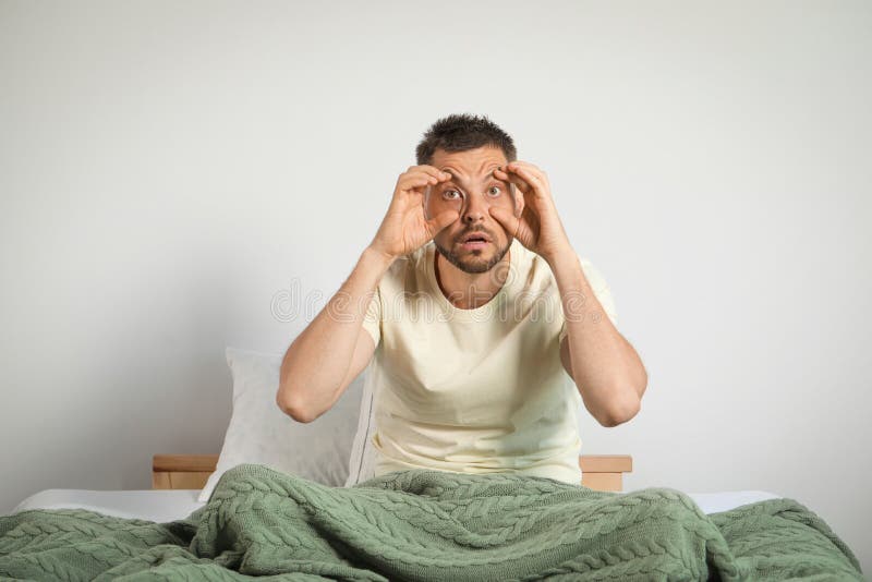 Sleepless Man Sitting on Bed at Home Stock Image - Image of disorder ...