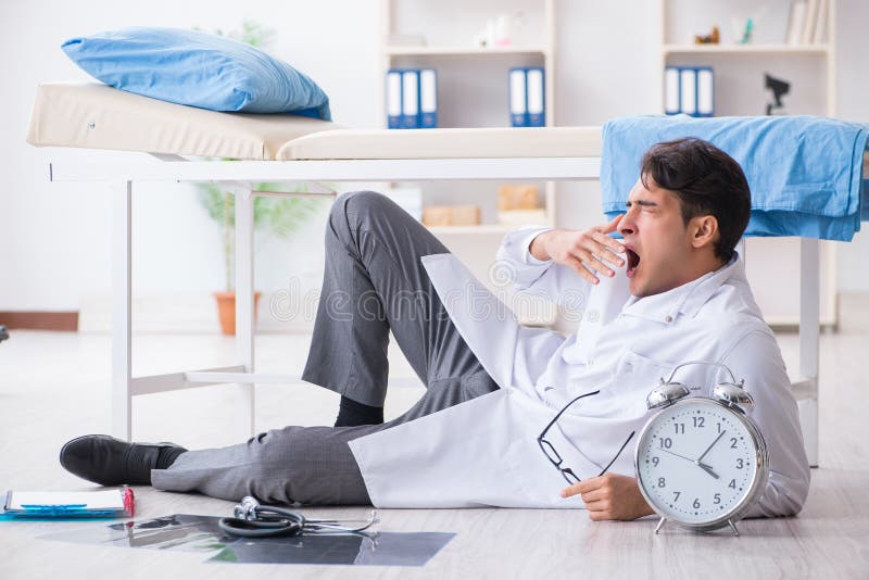The Sleepy Doctor Tired after Long Night Shift Stock Photo - Image of ...
