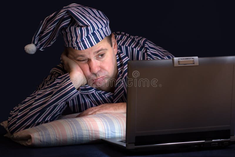 Man Sleeping in Bed with Computer Stock Photo - Image of communication ...