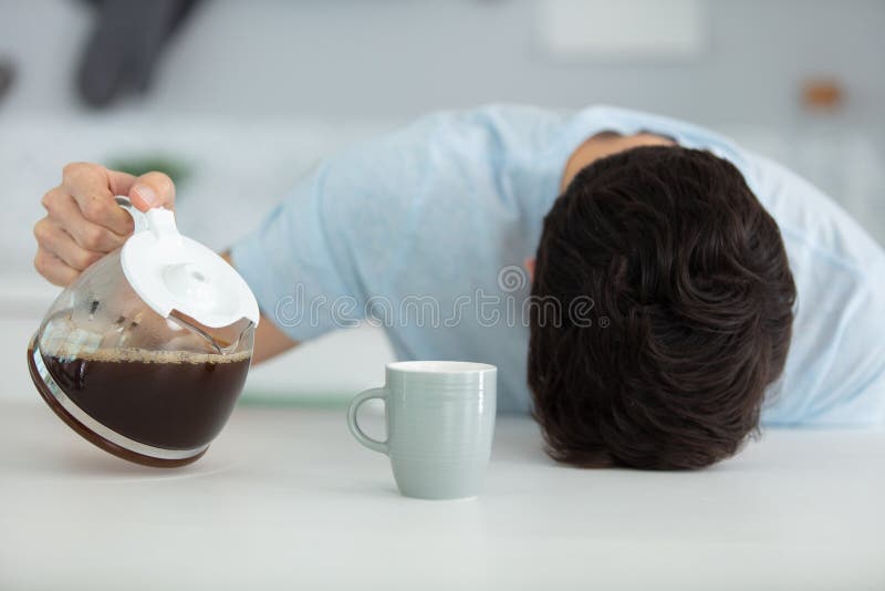Sleepy man with cup coffee stock photo. Image of desk - 237592074