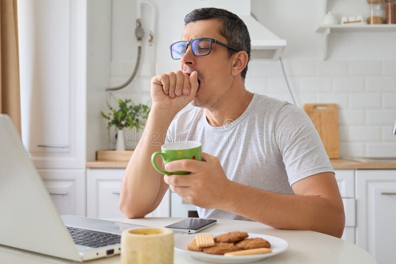 Sleepy Man Working with Laptop and Drinking Coffee, Needs Energy Being ...