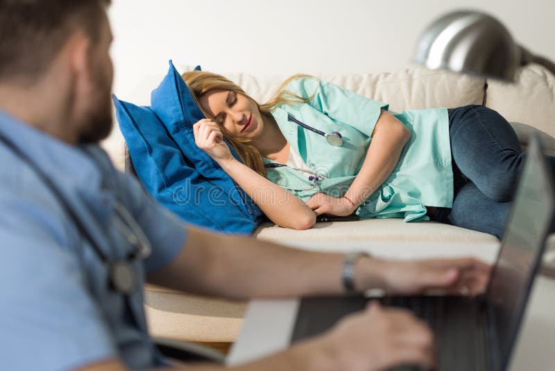 Sleepy nurse is resting stock image. Image of resting - 55249309