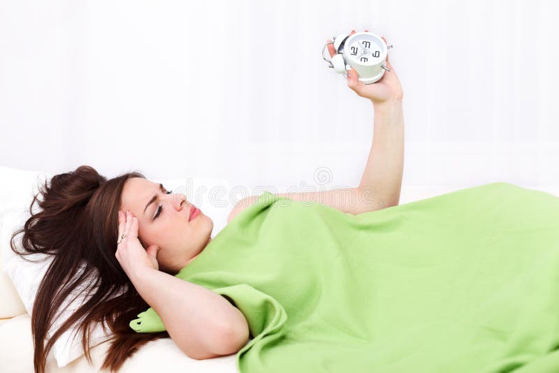 Tired woman in bed stock image. Image of relax, face - 27586175
