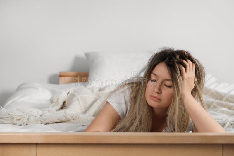 Sleepy Young Woman in Bed at Home Stock Photo - Image of exhaustion ...
