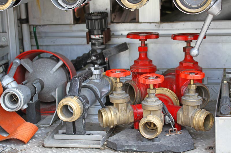 Sleeve Valves and Fire Lances of Trucks of Firefighters during a Stock ...