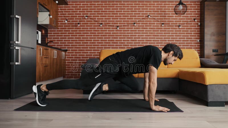 Slender Man Doing Running Plank Exercise at Home Stock Video - Video of ...