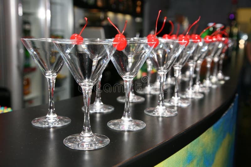 Slender Rows of Empty Cocktail Glasses on the Bar. Decorative Red ...