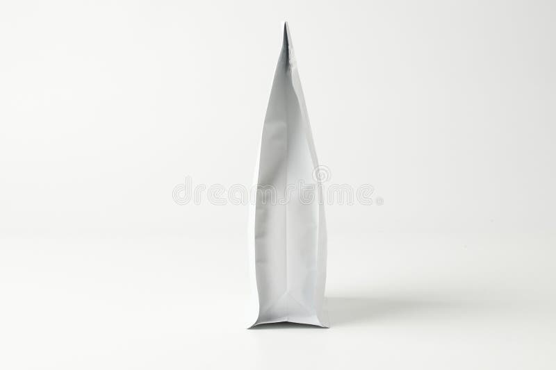 Sleek Silver Packaging Stands Upright Against a Plain Background on a ...