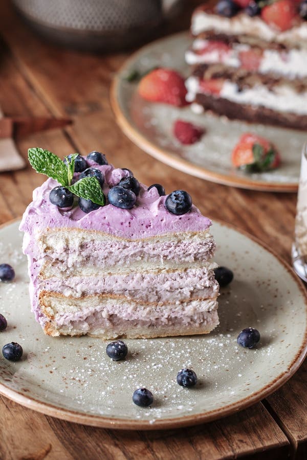 Slice of blueberry cake stock photo. Image of piece - 248899456