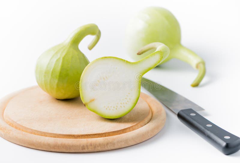 Slice Bottle Gourd Fruit on Wood Plate on White Stock Image - Image of ...