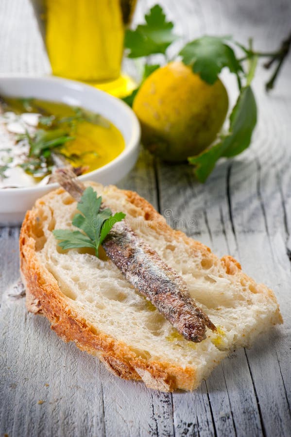 Slice bread with anchovy stock image. Image of eyes, salty - 18024099