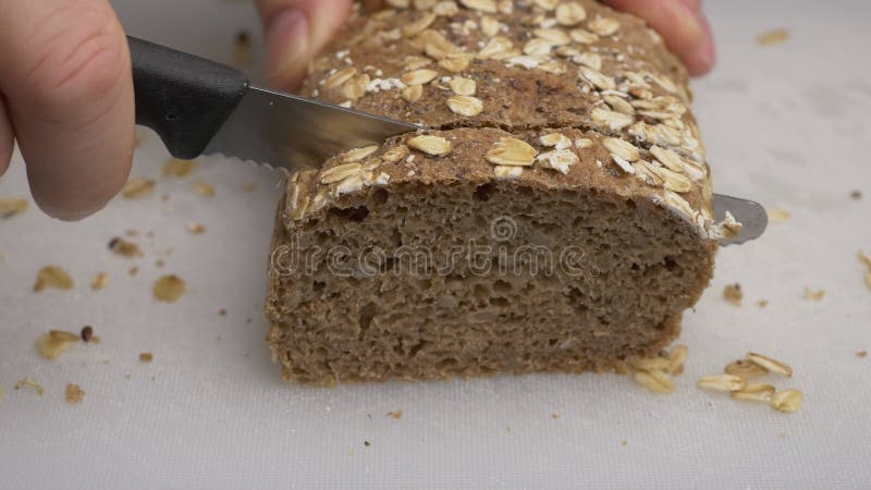 A Slice of Bread Falls Forward after Being Cut Stock Video - Video of ...