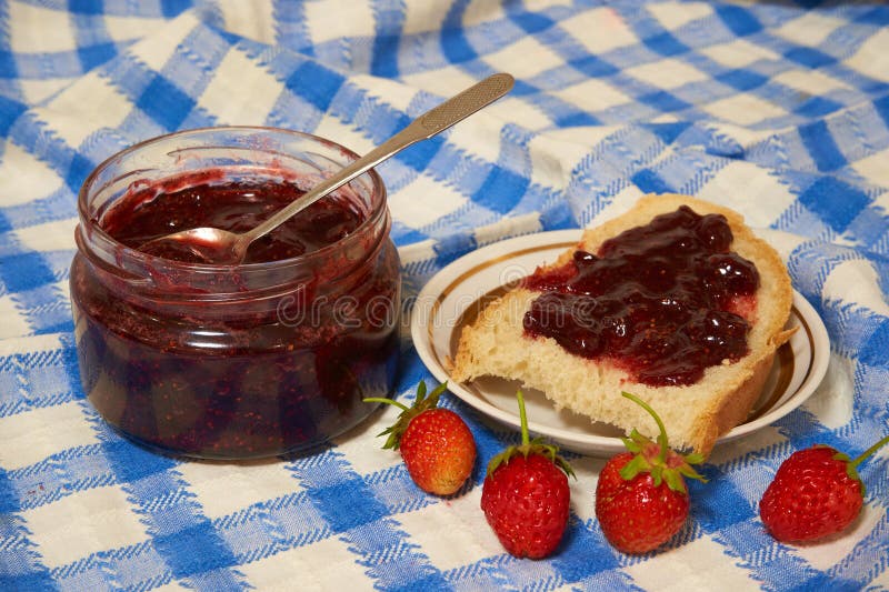Strawberry Jam with Bread,a Slice of Bread with Jam on the Table with a ...