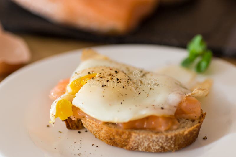 A Slice of Bread with Lightly Salted Red Fish and a Cooked Egg for ...