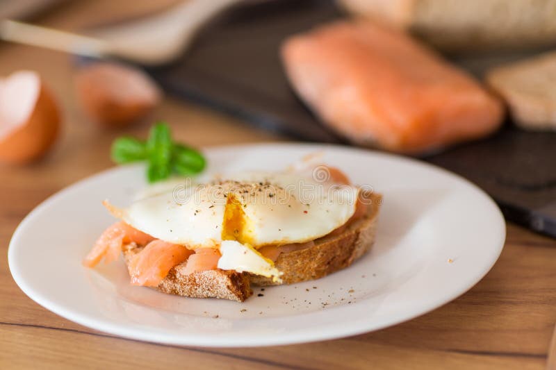 A Slice of Bread with Lightly Salted Red Fish and a Cooked Egg for ...