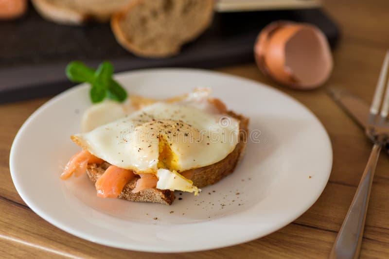 A Slice of Bread with Lightly Salted Red Fish and a Cooked Egg for ...