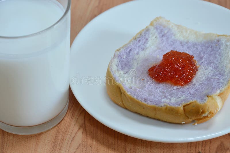 Slice Bread Mixed with Taro Topping Jam and Milk Stock Image - Image of ...