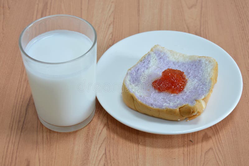 Slice Bread Mixed with Taro Topping Jam and Milk Stock Image - Image of ...