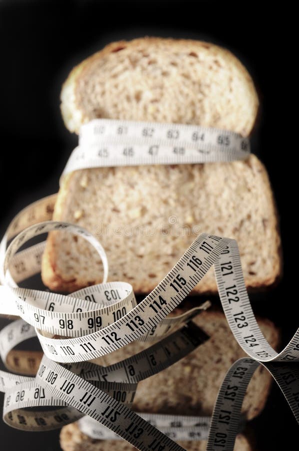 Slice of Bread Surrounded by a Measurement Tape Stock Image - Image of ...