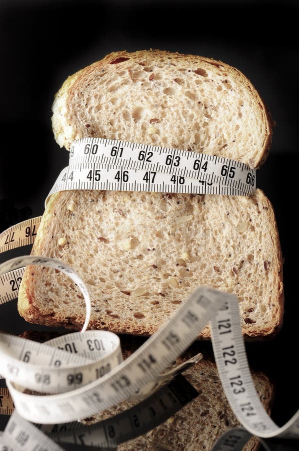 Slice of Bread Surrounded by a Measurement Tape Stock Image - Image of ...