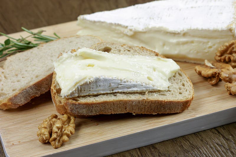 Slice of brie and bread stock photo. Image of french - 174282338