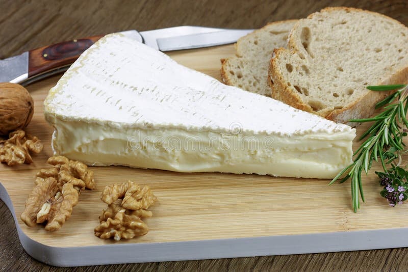 Slice of brie and bread stock image. Image of french - 174282687