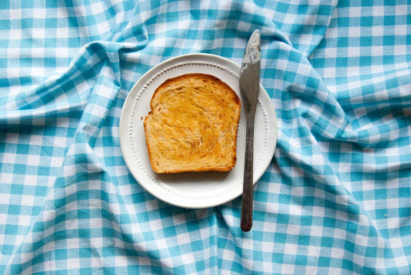 Slice of Buttered Toast on a Plate Stock Image - Image of ruffle ...