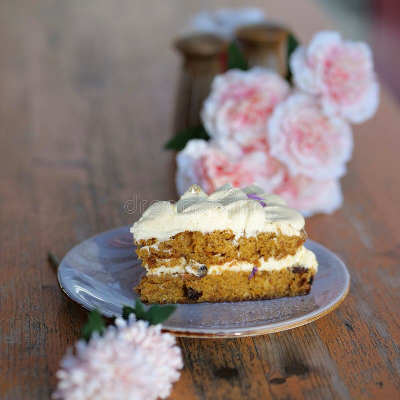 Slice of Cake with Flower Design on a Plate Stock Photo - Image of ...