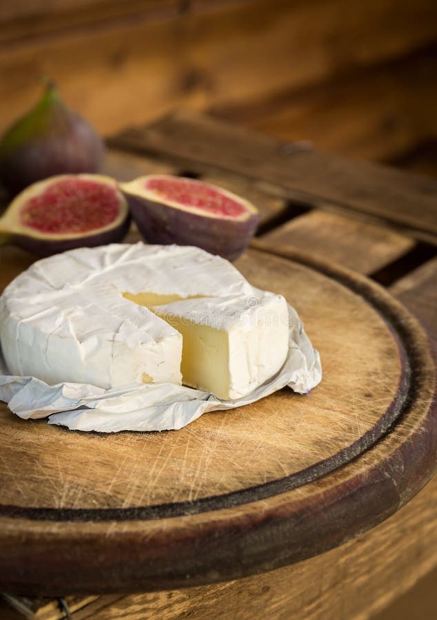 Slice Camembert on Old Wooden Board Stock Photo - Image of healthy ...