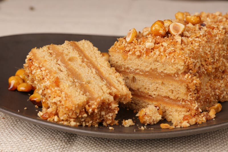 Slice of Caramel Nut Cream Cake Stock Photo - Image of delicious ...