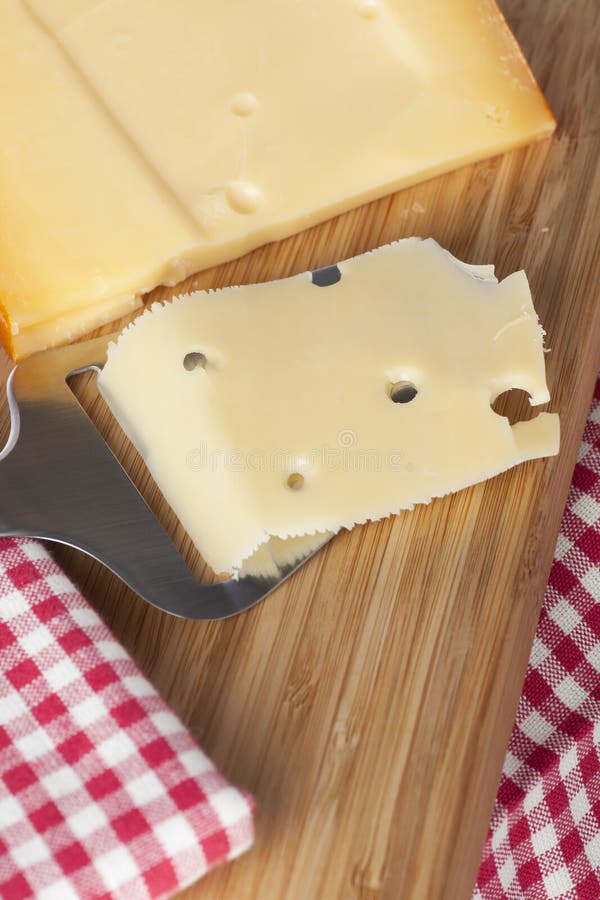 Slice of Cheese stock image. Image of wedge, board, gouda - 17846743