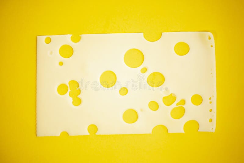 Slice of Cheese with Holes on a Yellow Stock Image - Image of yellow ...