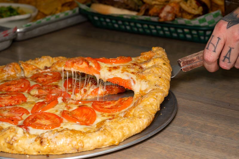 Slice of Cheese Pizza with Tomatoes Being Pulled Stock Photo - Image of ...