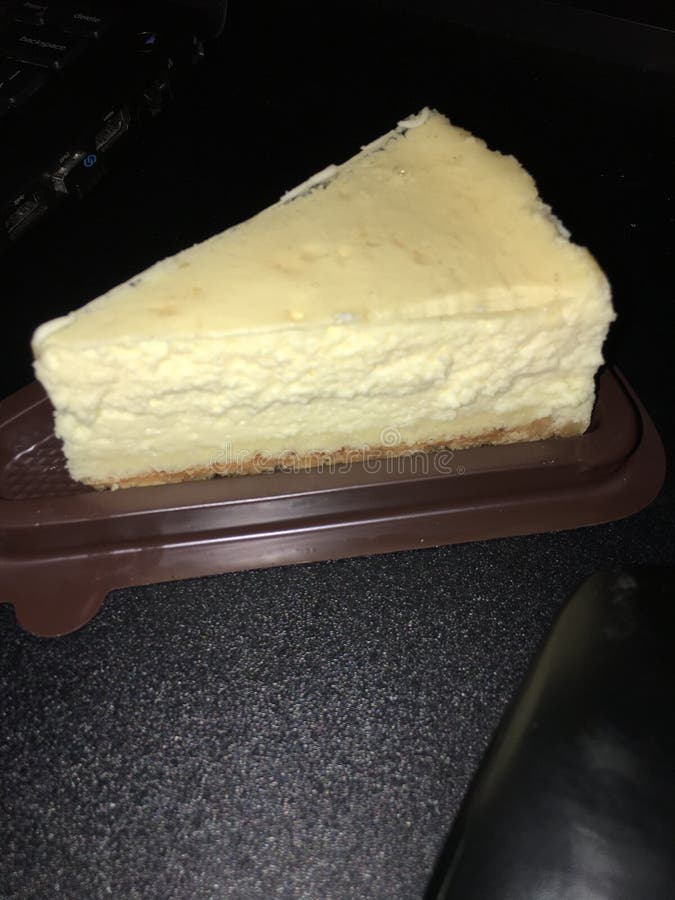 A slice of Cheesecake stock photo. Image of dinner, lunch - 262831158