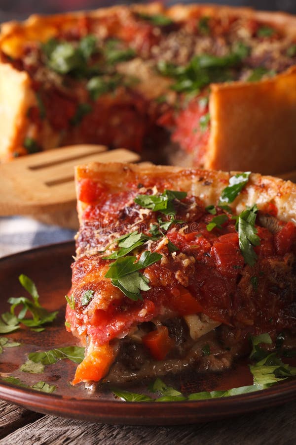 Slice of Chicago Deep Dish Pizza on a Plate Macro. Vertical Stock Image ...