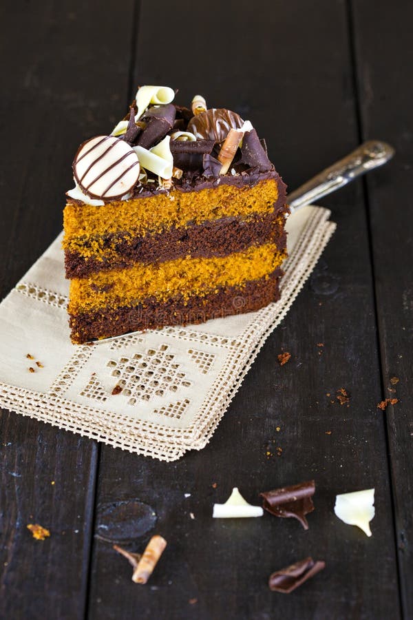 Slice of Chocolate and Toffee Layer Cake Stock Photo - Image of flakes ...