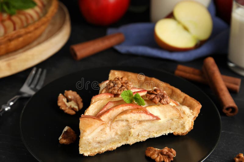 Slice of Delicious Apple Pie on Black Table Stock Image - Image of mint ...