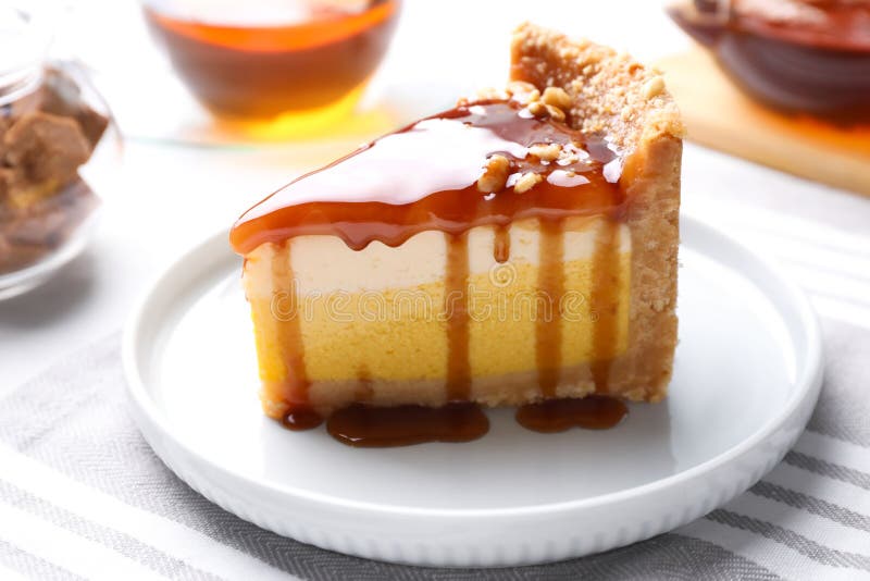 Slice of Cake with Caramel Sauce on Table Stock Image - Image of molten ...
