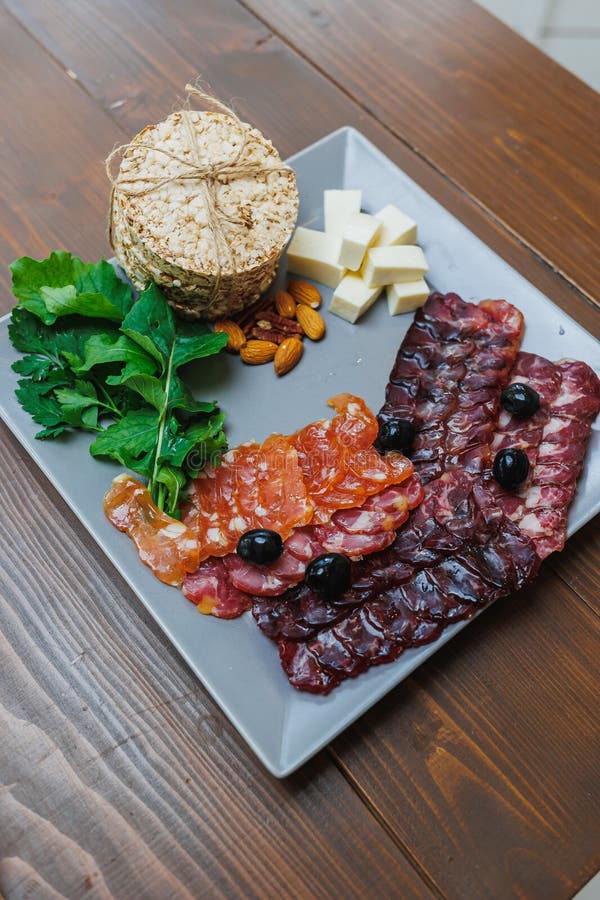 Slice of Dried Meat with Vegetables. Delicious Snacks Made of Ham Stock ...