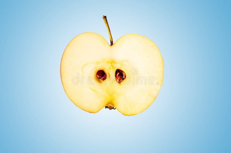 Slice of Fresh Apple on a Blue Background Stock Photo - Image of slice ...