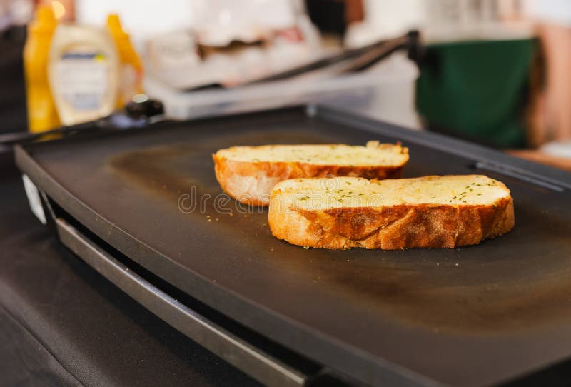 Slice of Garlic Bread on the Hot Pan. Stock Image - Image of dish ...
