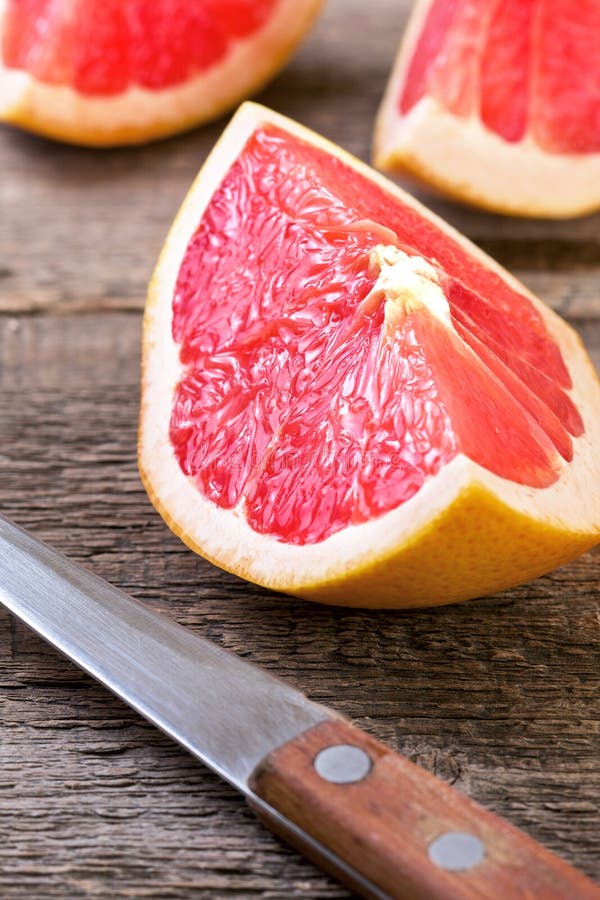 Slice of grapefruit stock photo. Image of healthy, sweet - 35671216
