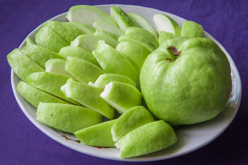 Slice of guava on dish stock image. Image of fruit, food - 63650853