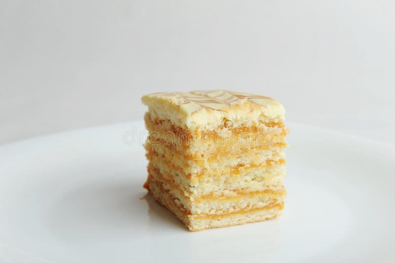 Slice of Honey Layer Cake on White Plate. Side View. Layer Cake, Close ...