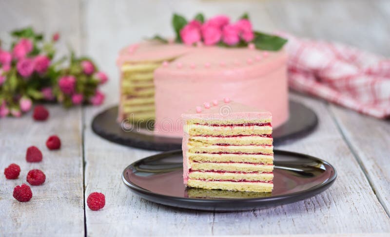 Slice of Layered Creamy Fruit Cake. Raspberry Layer Cake Stock Photo ...