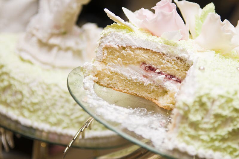 Slice of Light Wedding Cake Stock Photo - Image of plate, black: 158227490