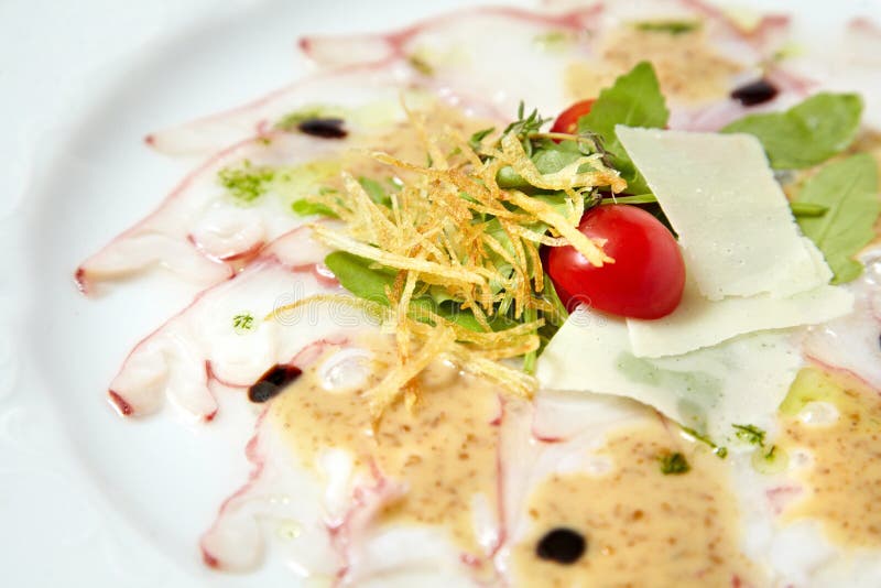 Slice of Octopus with Sauce and Parmesan Stock Photo - Image of mollusk ...